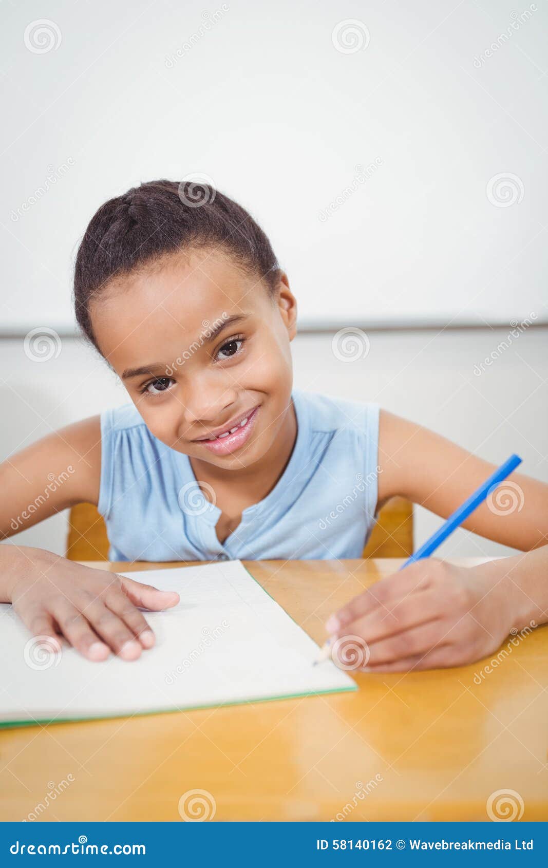 Pupil Writing into a Notebook Stock Photo - Image of notepad, person ...