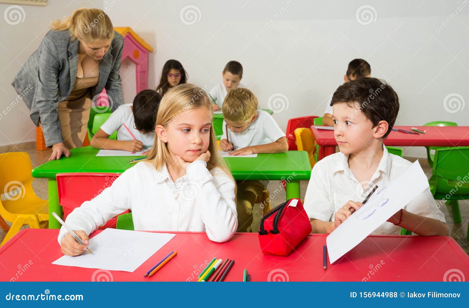 Pupils Chattering at Lesson Stock Photo - Image of fellow, classmate ...