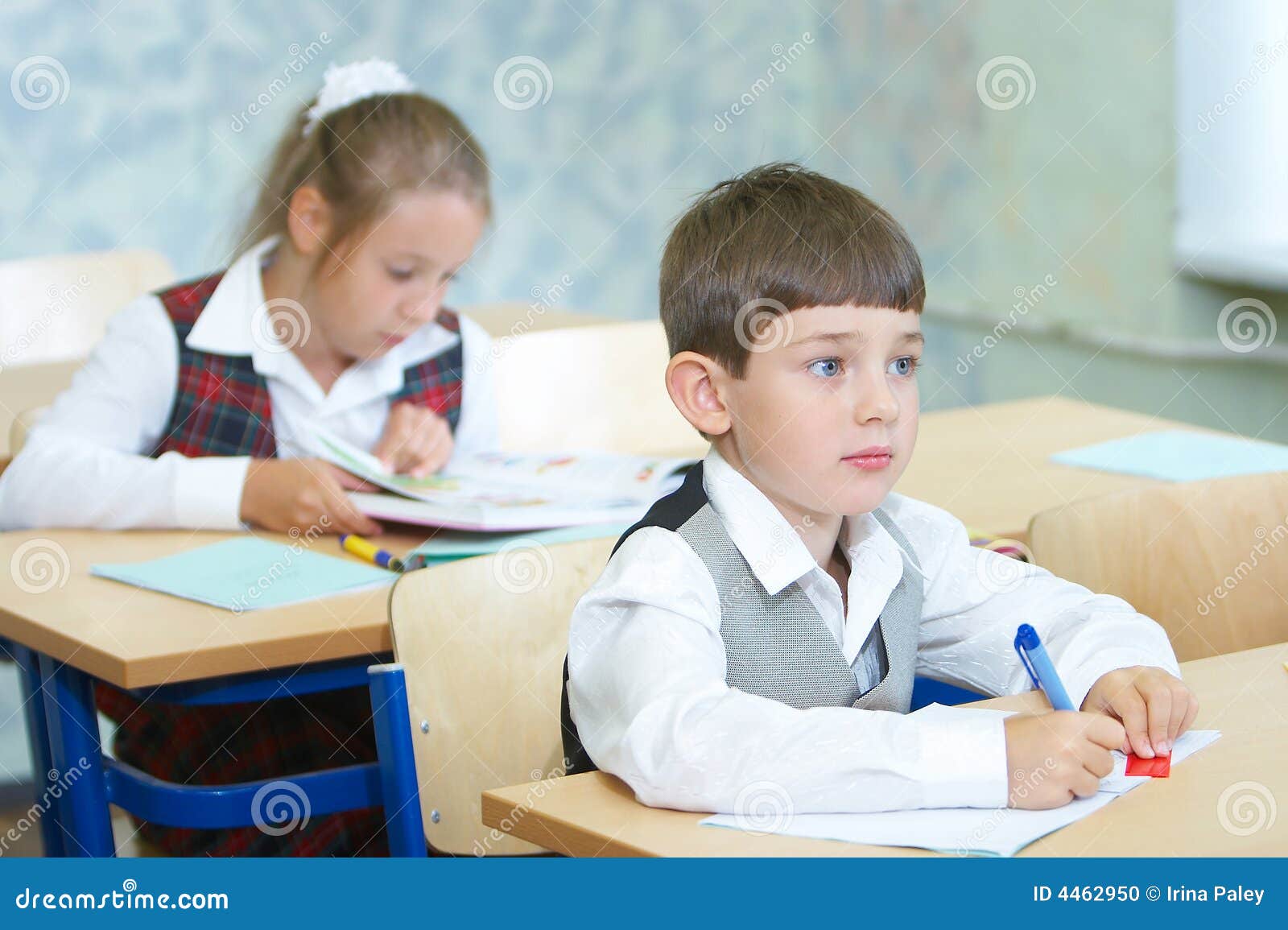 Pupils in a class stock photo. Image of school, desk, book - 4462950