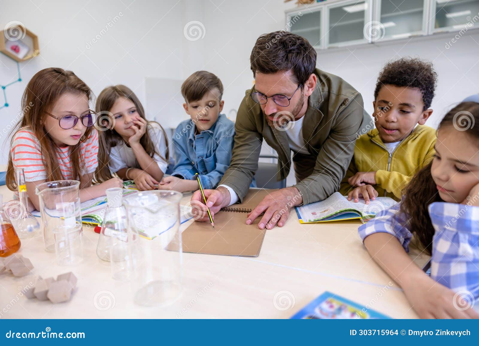 Pupils Doing Science with Teacher in Classroom. Stock Photo - Image of ...