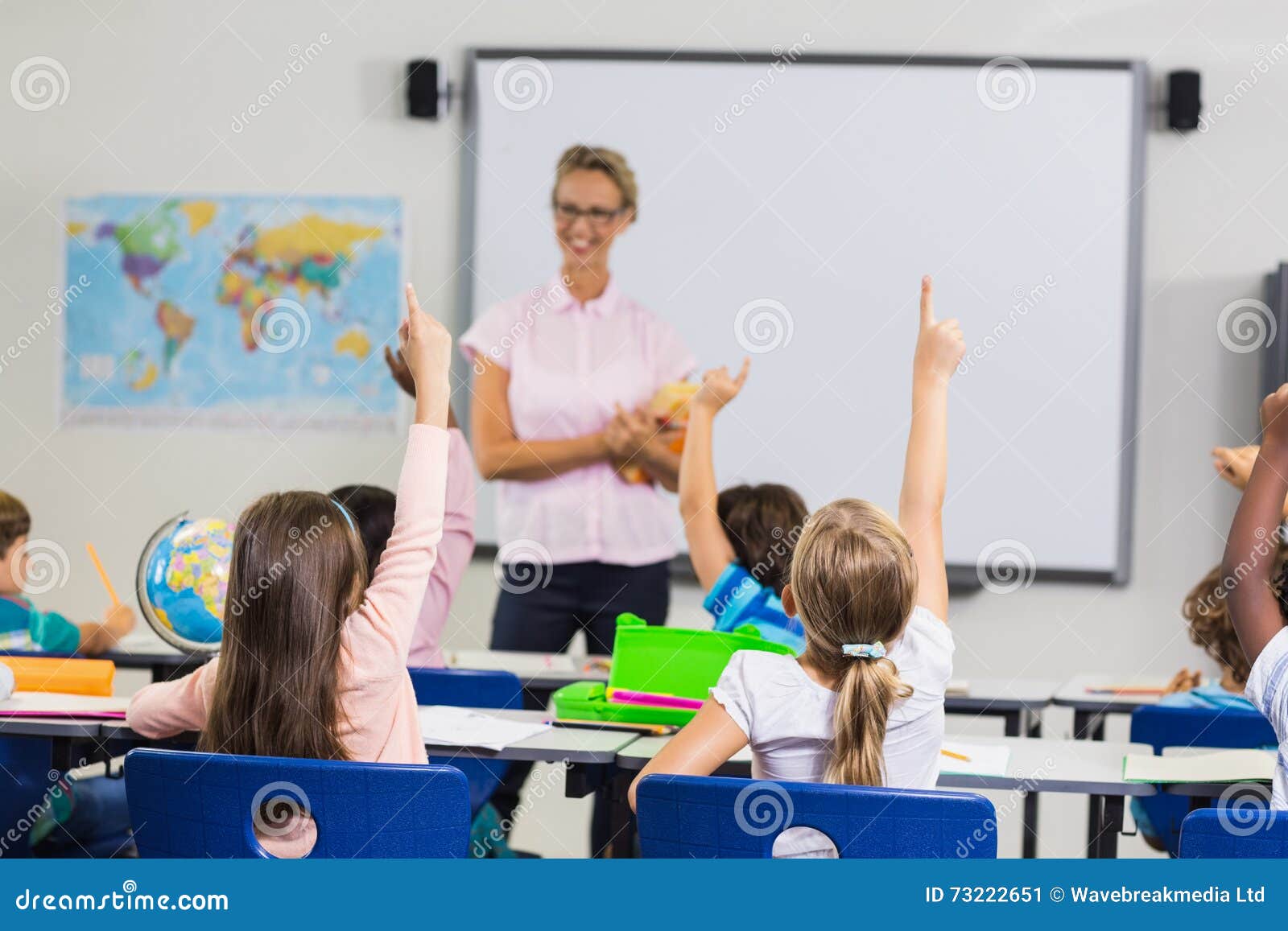 Pupils with Hands Up during Lesson Stock Image - Image of adult ...