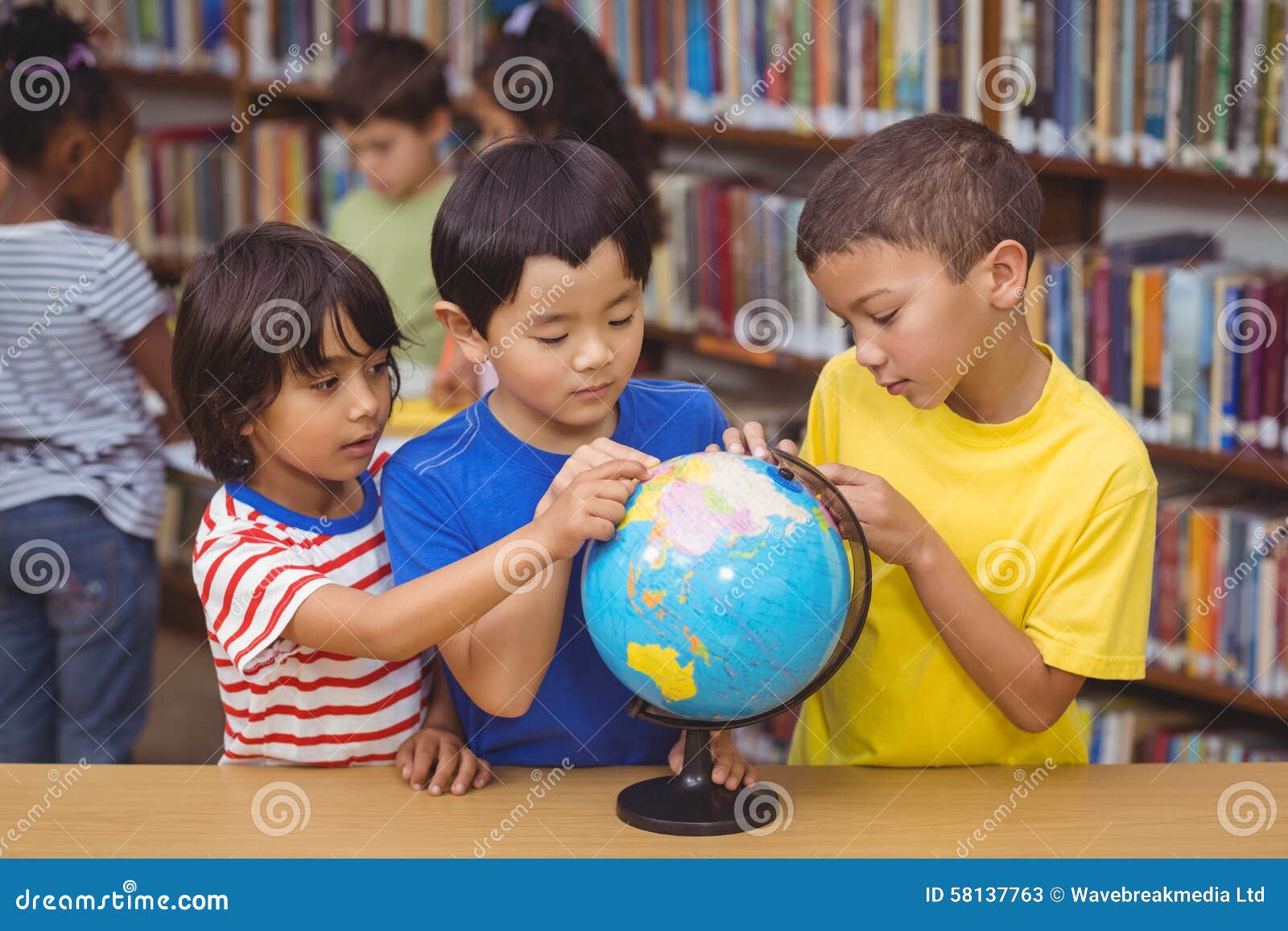 Pupils in Library with Globe Stock Image - Image of book, female: 58137763