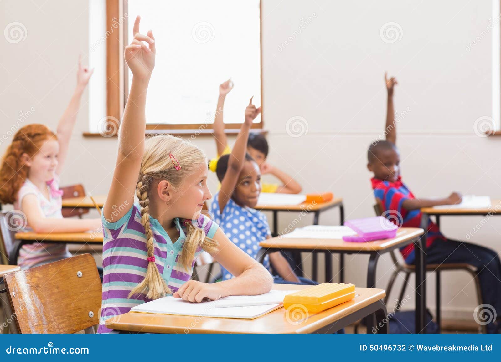 Pupils Raising Their Hands during Class Stock Photo - Image of ...
