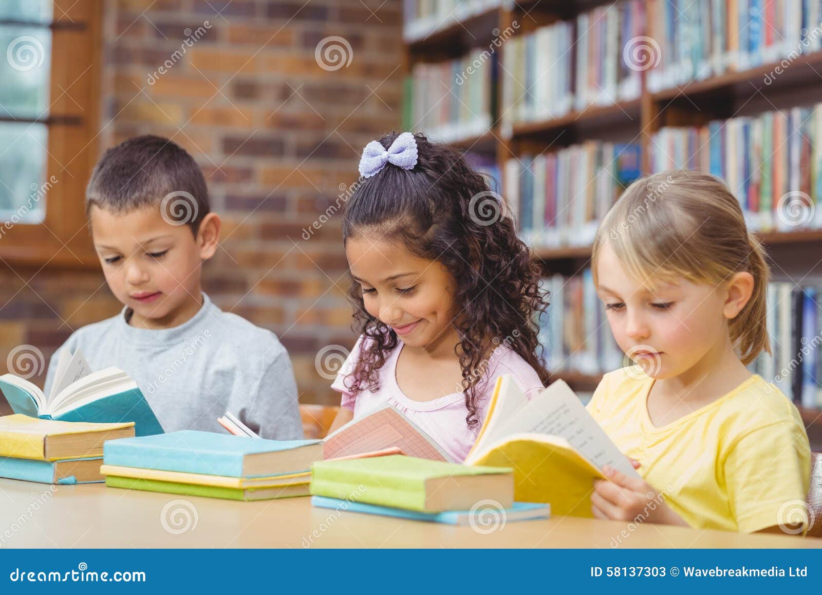 Pupils Reading Books in Library Stock Image - Image of cheerful ...