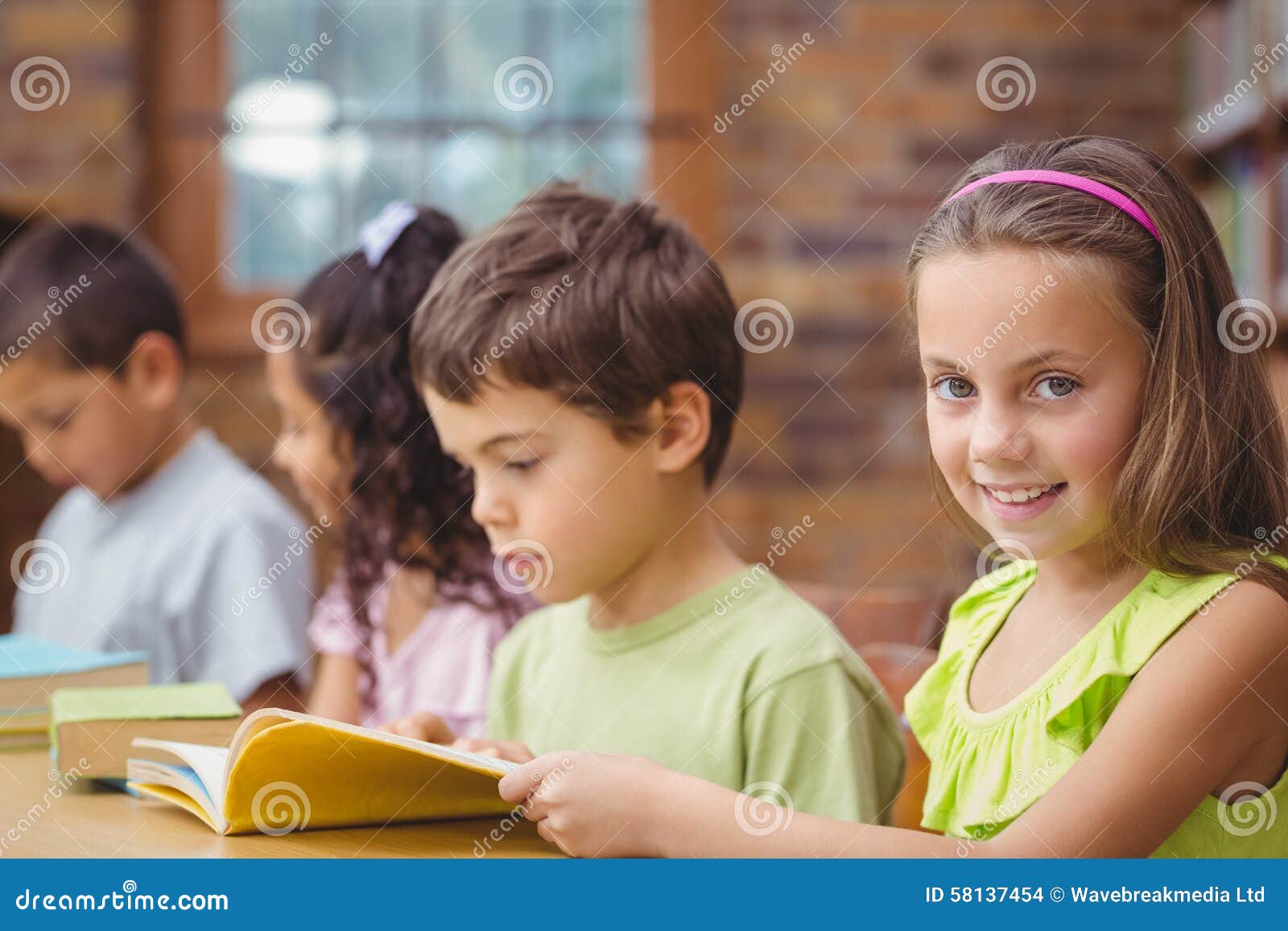 Pupils Reading Books in Library Stock Photo - Image of book, indoors ...