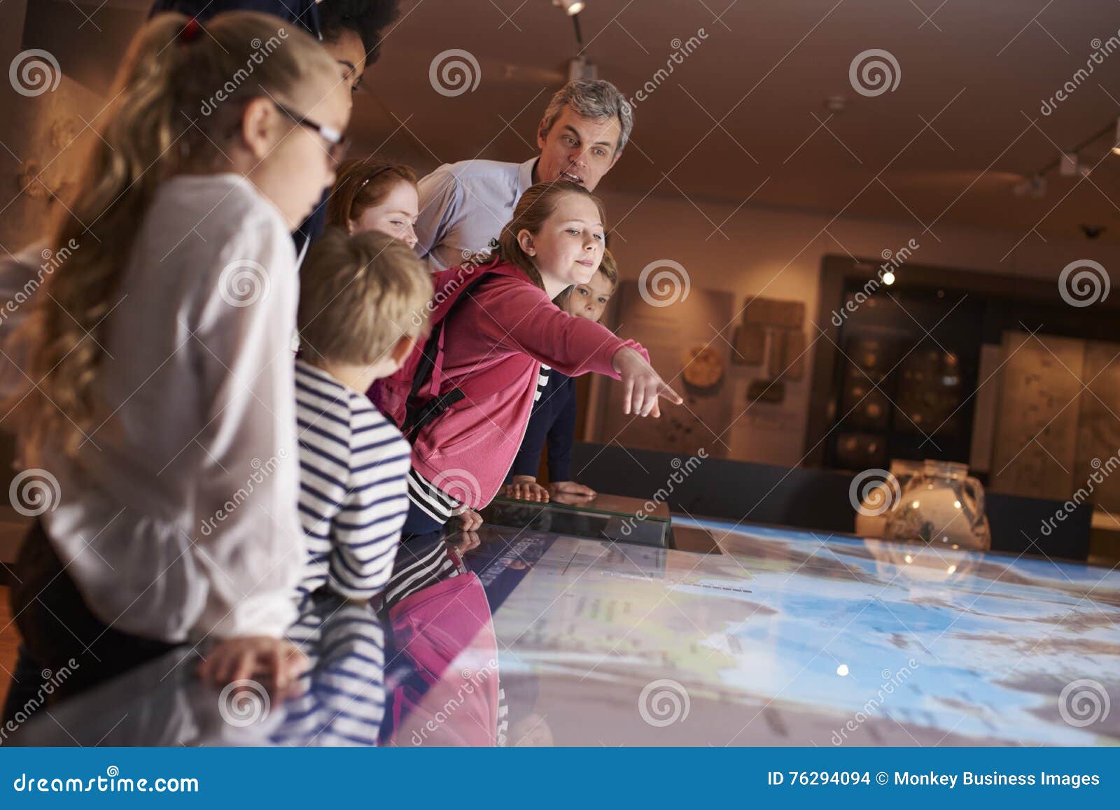 Pupils on School Field Trip To Museum Looking at Map Editorial Stock ...