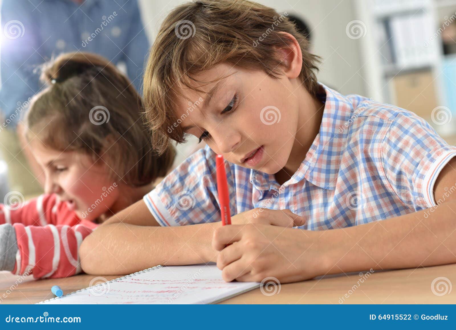 Pupils at School Writing in Notebooks Stock Photo - Image of writing ...