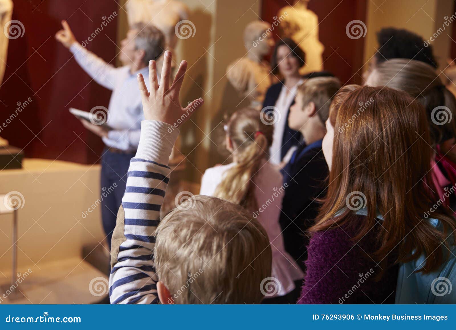 Pupils and Teacher on School Field Trip To Museum with Guide Editorial ...