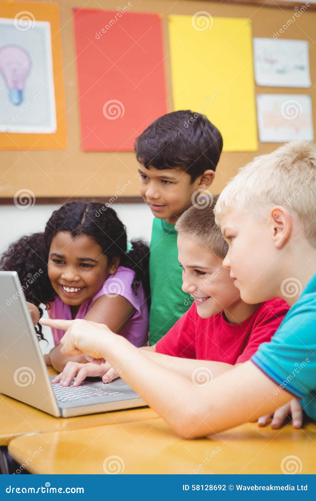 Pupils Using a Laptop in Class Stock Photo - Image of elementary ...