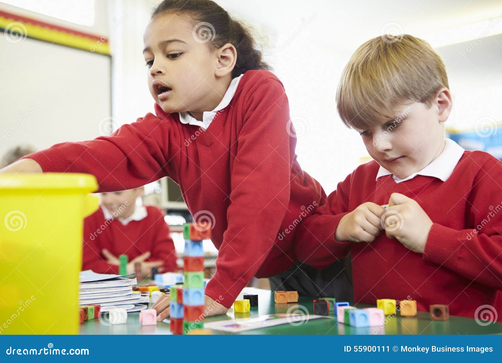 Pupils Working with Coloured Blocks in Maths Lesson Stock Image - Image ...
