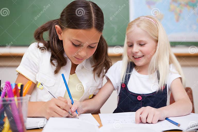 Pupils working together stock photo. Image of clever - 22692292
