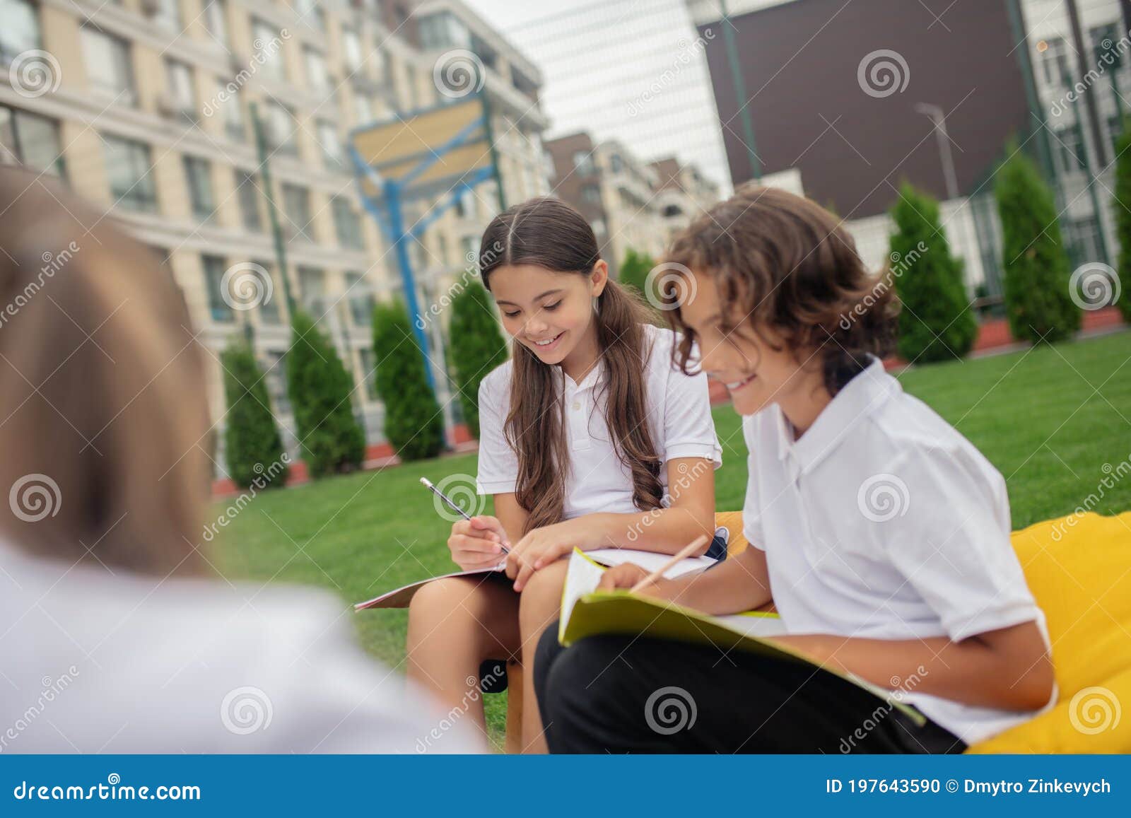 Pupils Working Together on a Project and Looking Excited Stock Photo ...
