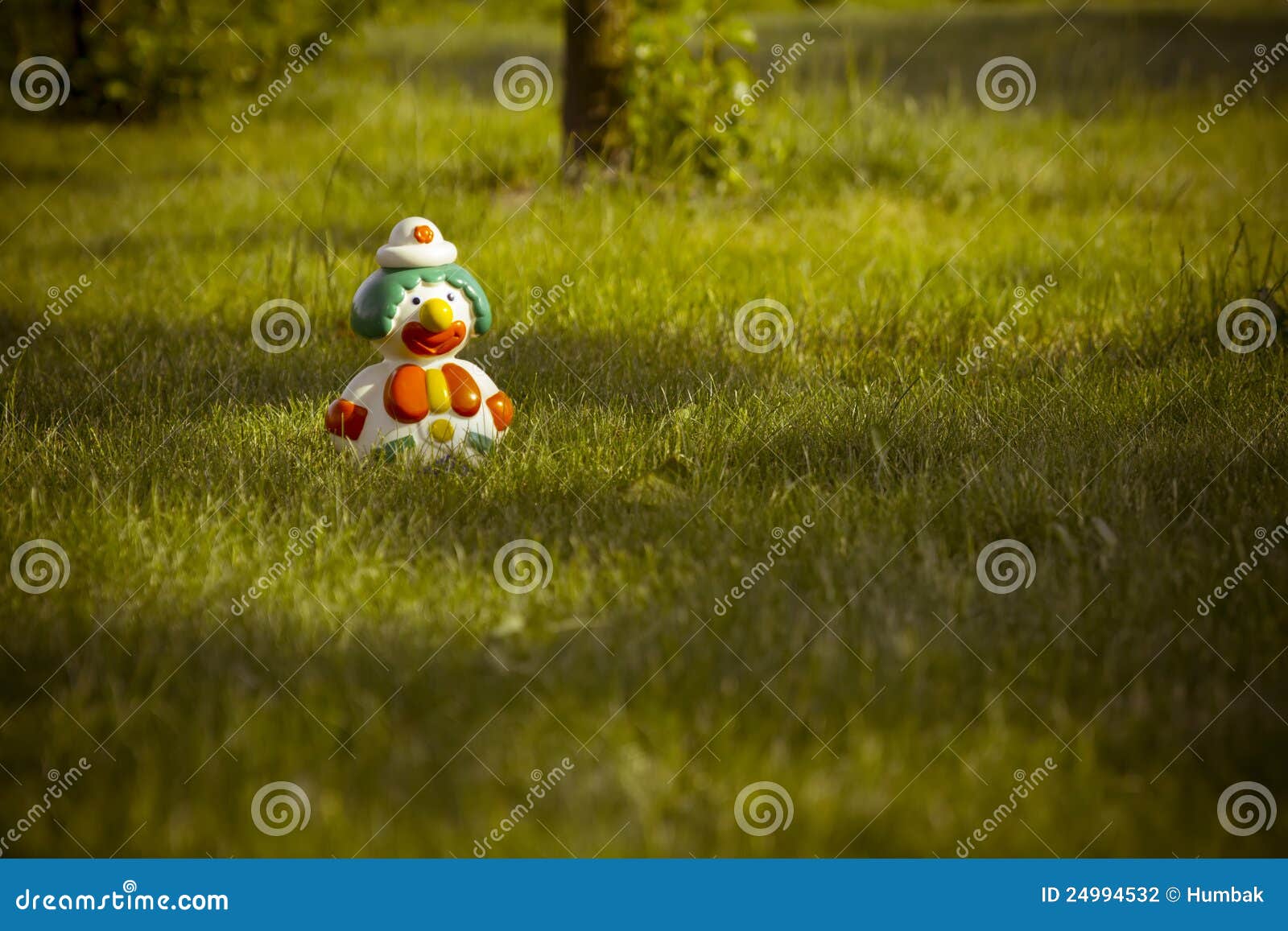 A Puppet-clown, Entangled In Threads And Lying Limp Stock Photo ...