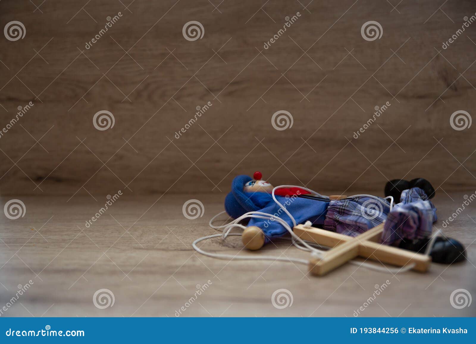 A Puppet-clown, Entangled in Threads and Lying Limp Stock Photo - Image ...