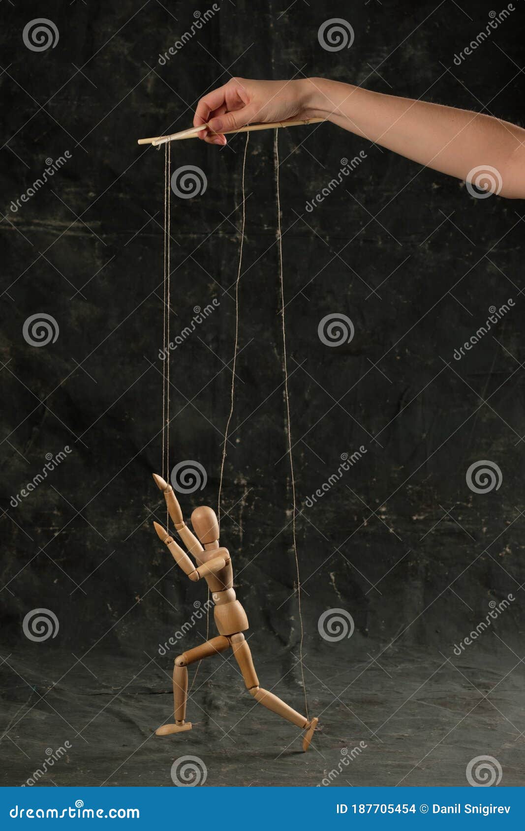 Puppet in the Hands of Puppeteer Walks on Isolated, Background. the ...