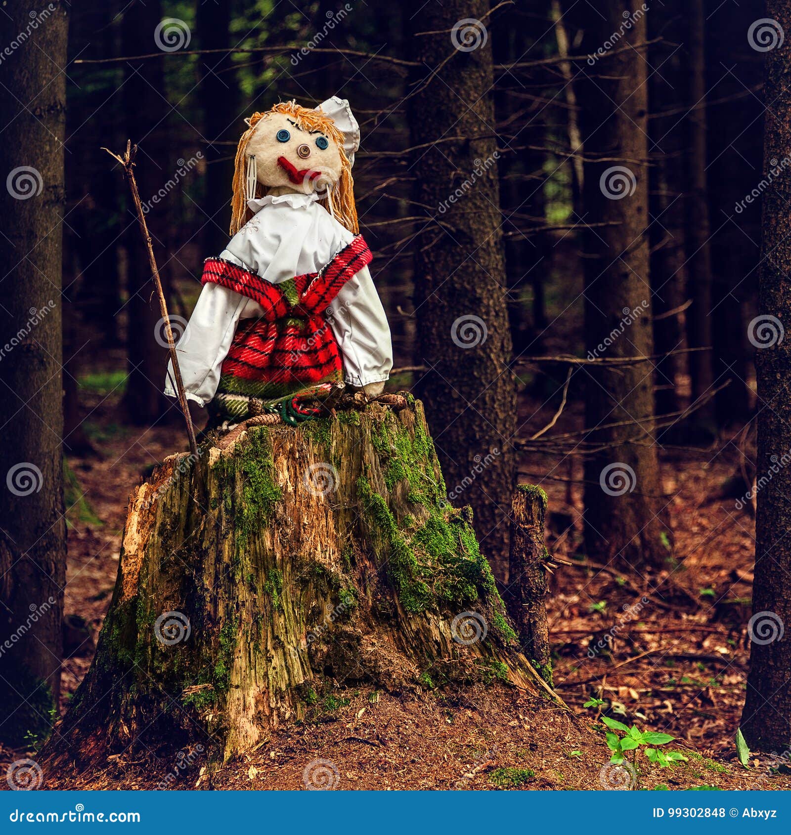 Puppet on a tree stump stock photo. Image of marionette - 99302848