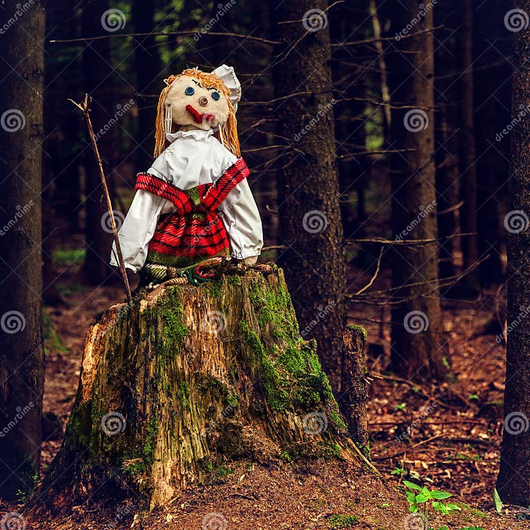 Puppet on a tree stump stock photo. Image of marionette - 99302848