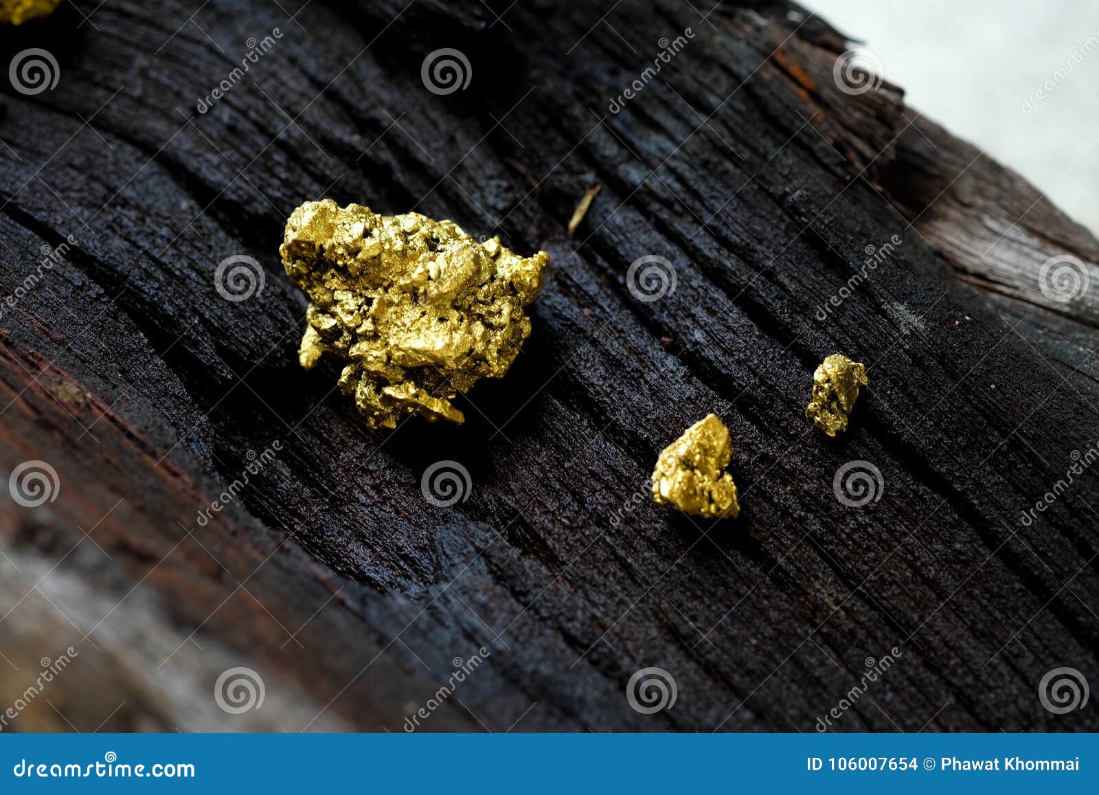 Pure Gold Ore on Old Wooden Stock Photo - Image of nuggets, cash: 106007654