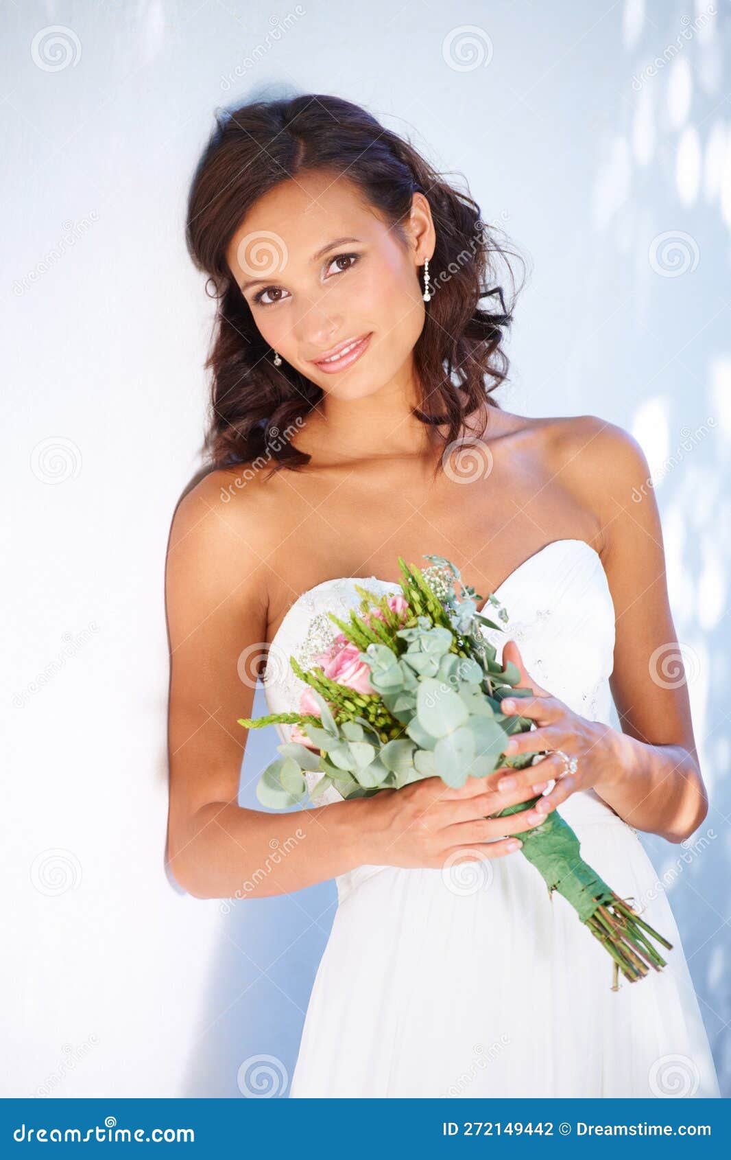 Pure and Pretty. a Gorgeous Bride Standing Outside with Her Bouquet ...
