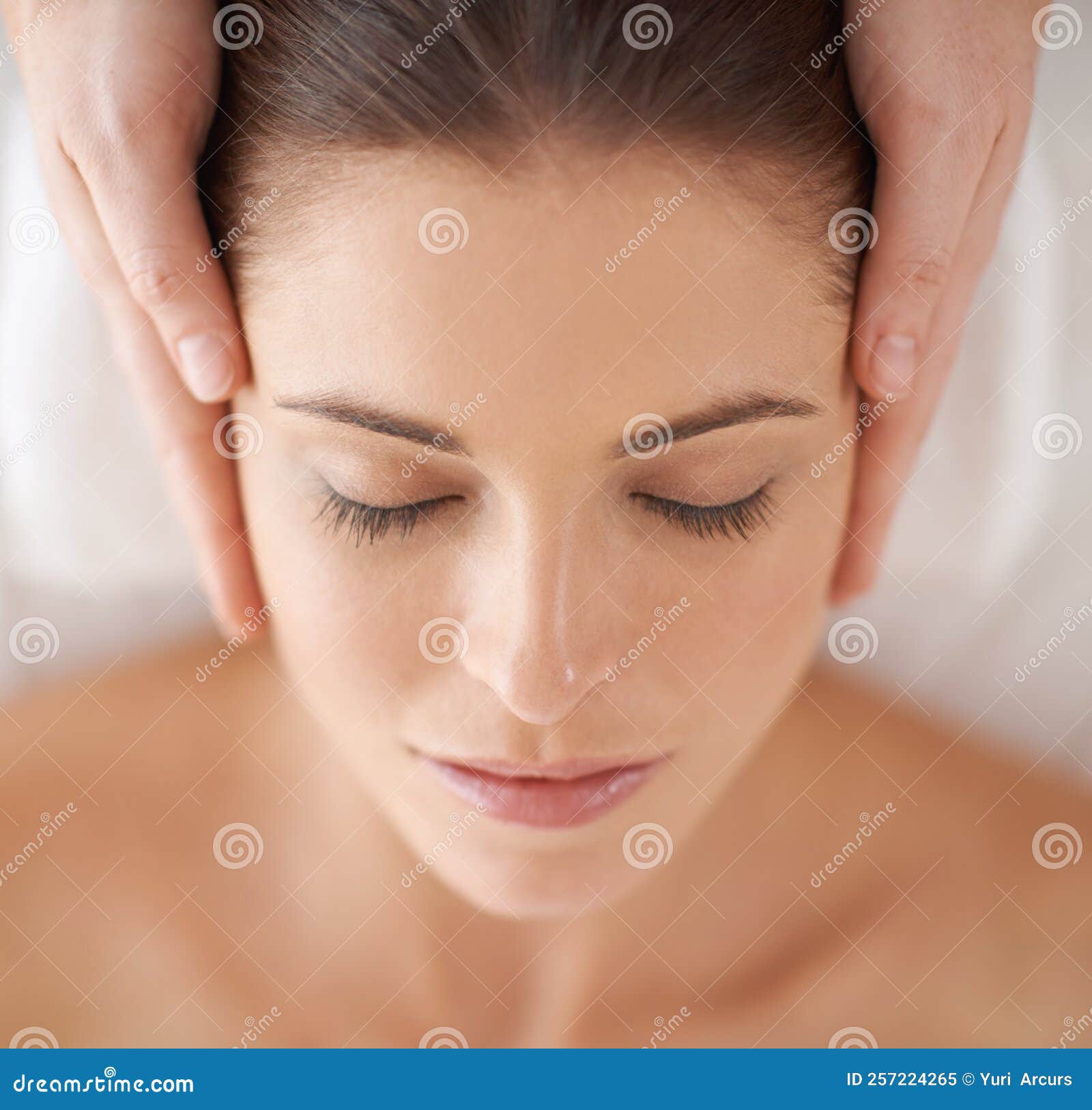 Pure Relaxation Closeup Shot Of A Young Woman Receiving A Head Massage