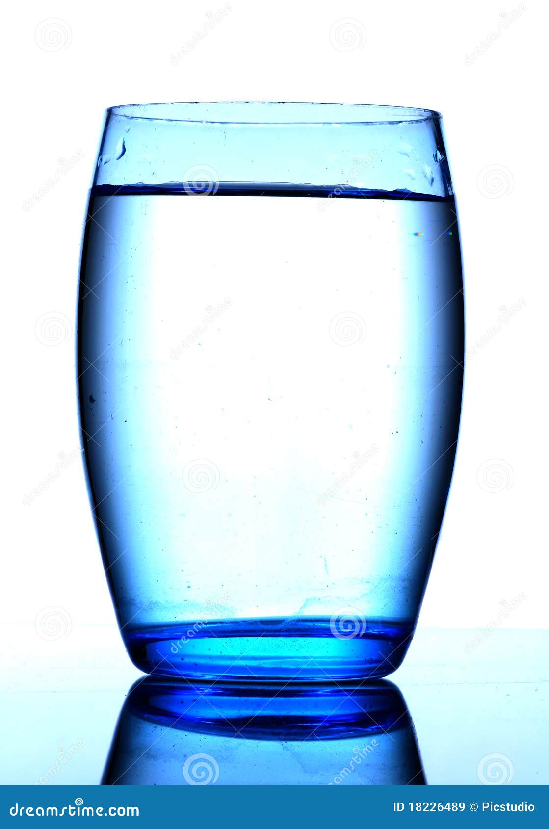 Pure Water In Plastic Bottle And Water Glass On Wooden In Nature ...