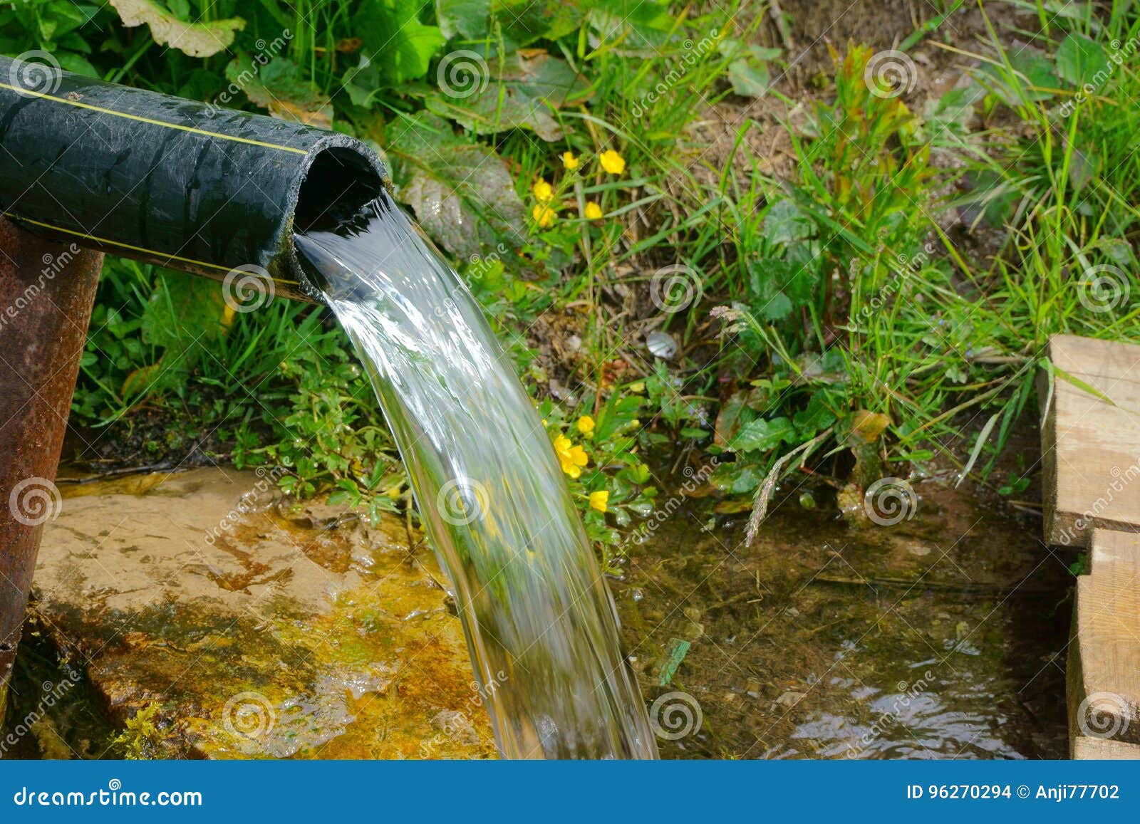 Pure Water Flows from the Pipe Stock Photo - Image of fountain, park ...