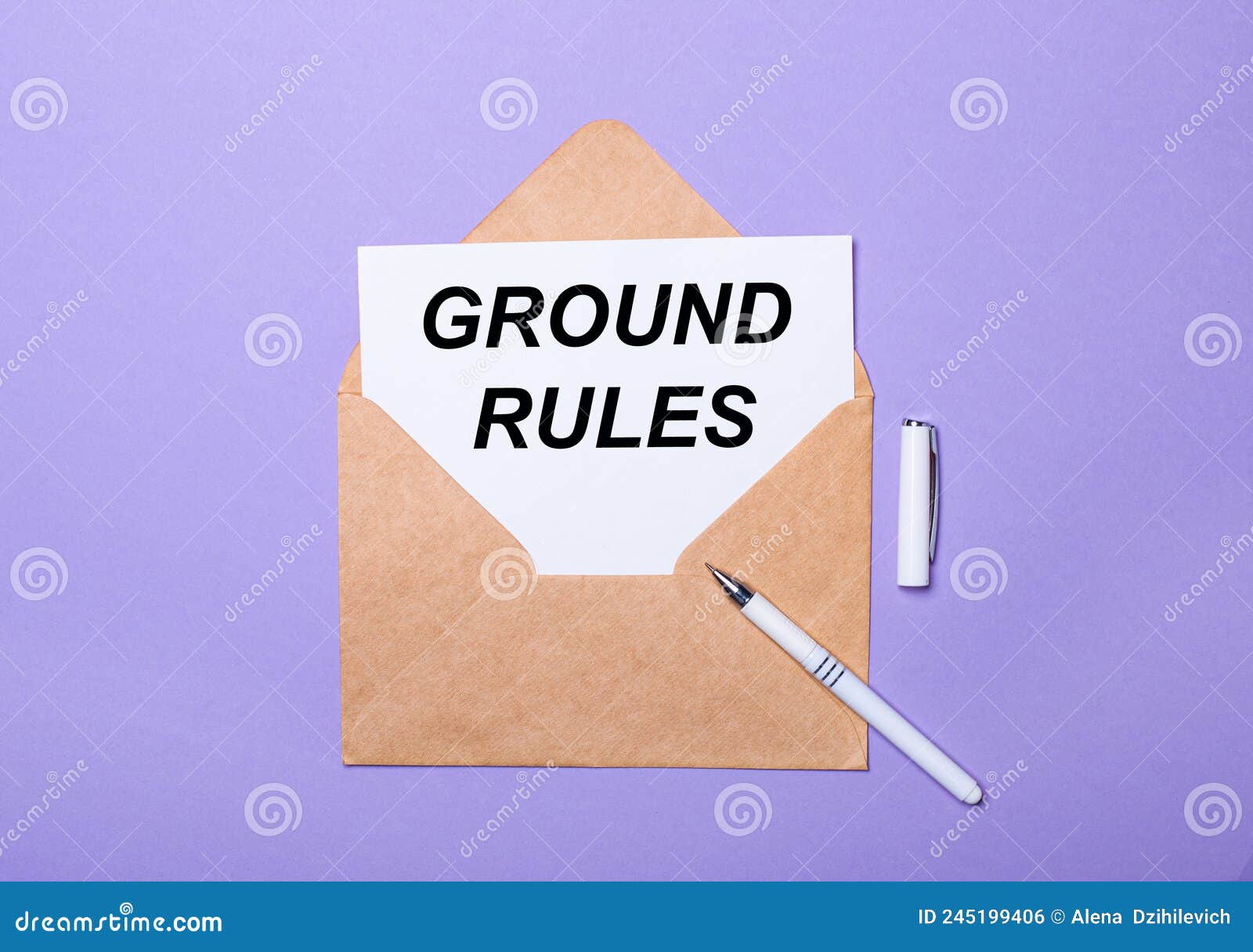 On a Purple Background, a White Pen, a Craft Envelope and a White Card ...