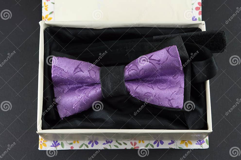 Purple Bow Tie in Present Box on Black Background Stock Photo - Image ...