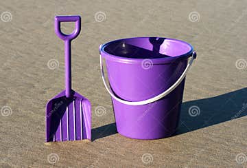 Purple bucket and spade stock image. Image of beach, rocks - 8917869