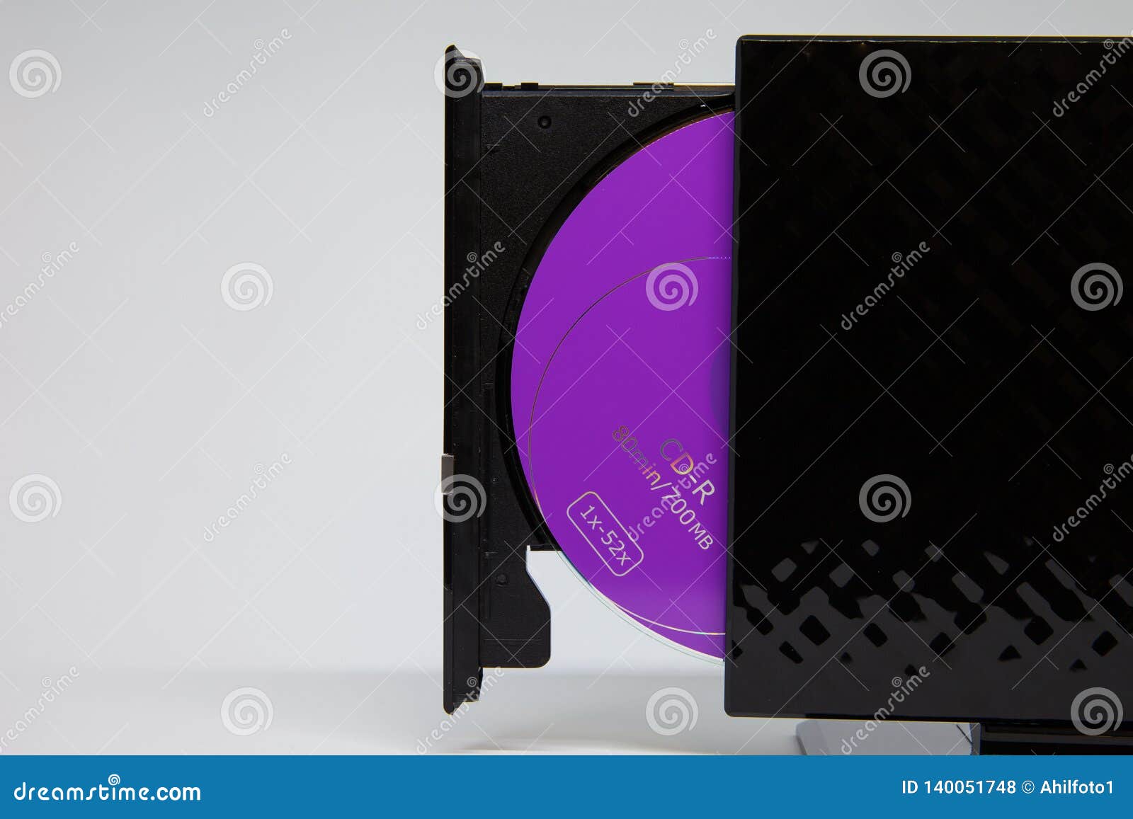 Purple Cd Disk in Black Drive. Stock Photo - Image of filled, blanks ...