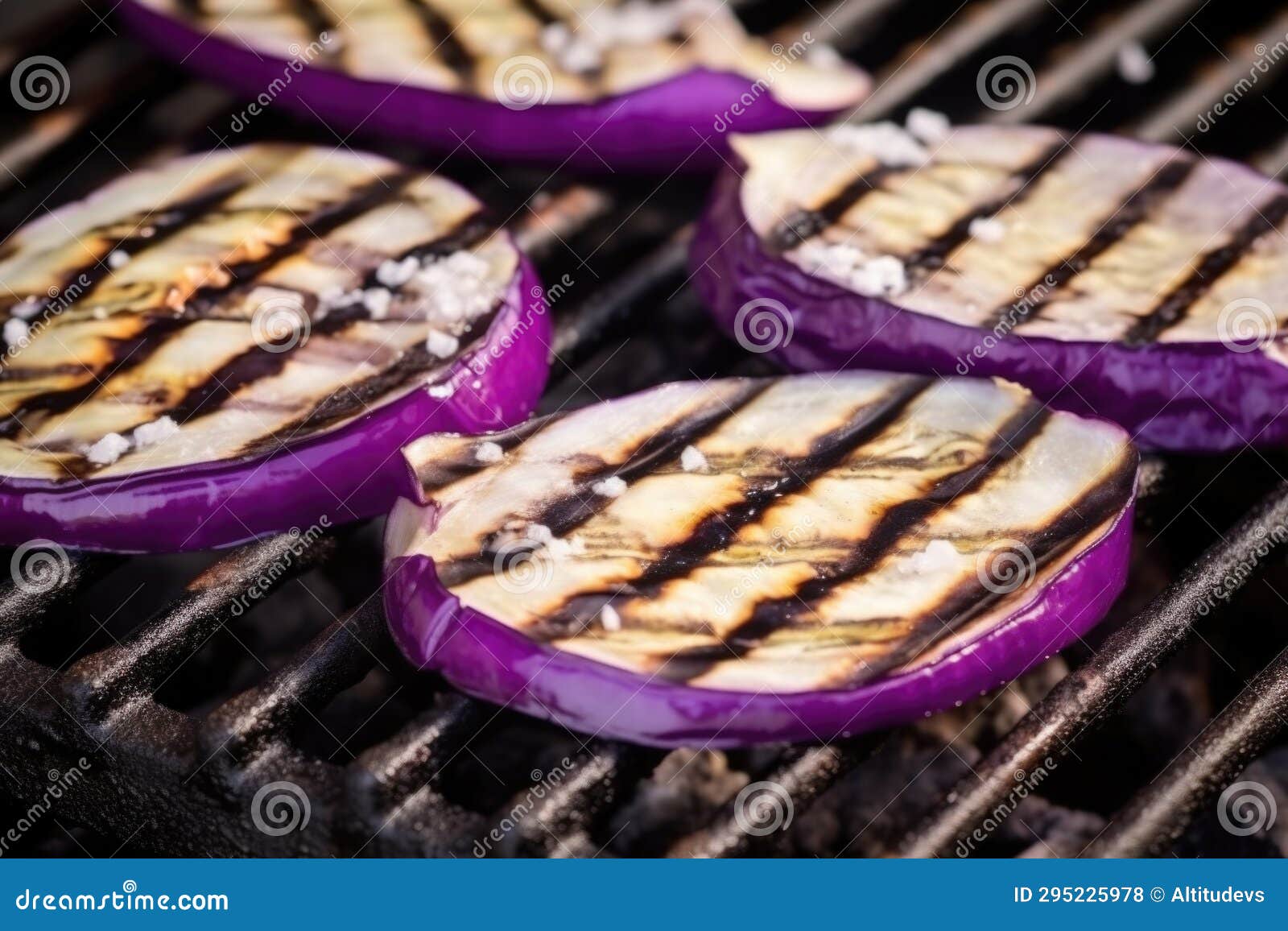 Purple Eggplant Slices on a Grill with Visible Grill Marks Stock Photo ...