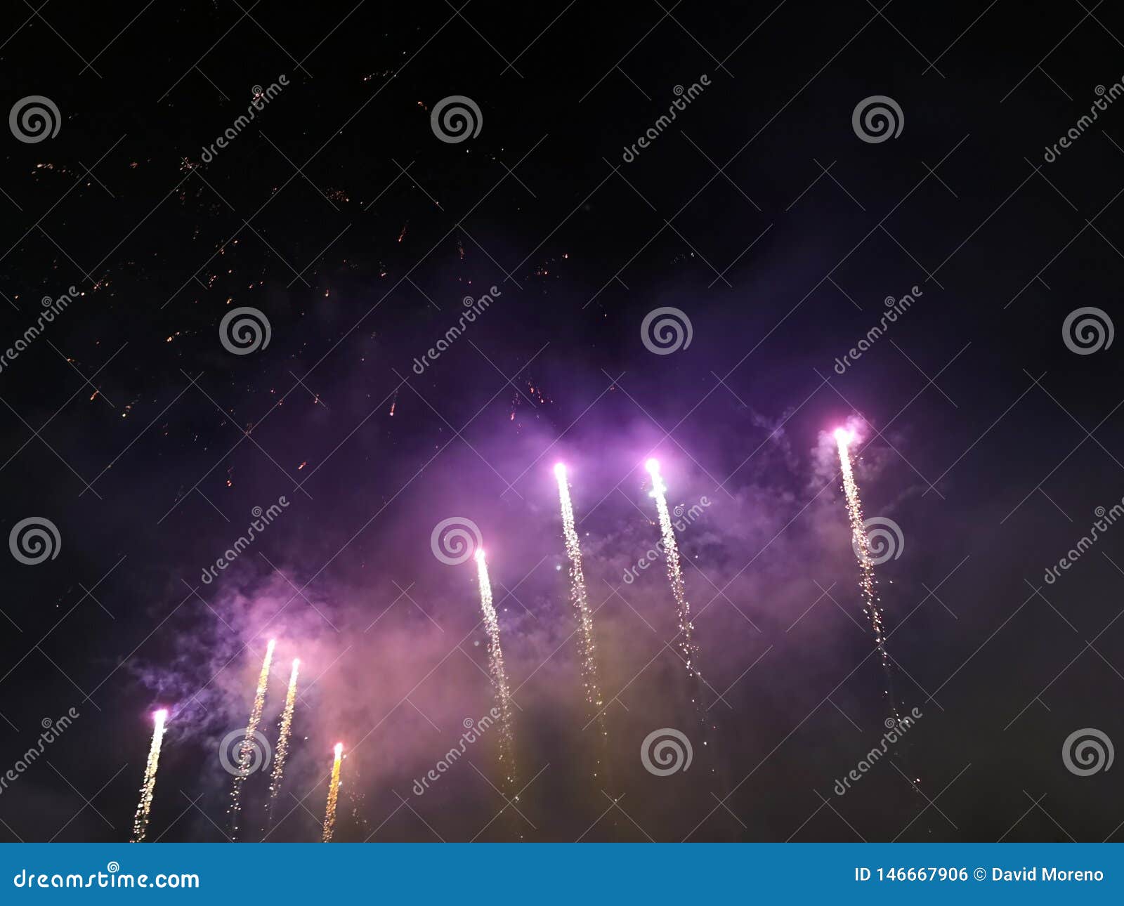 Purple Fireworks Trail in the Night Sky Stock Photo - Image of flame ...