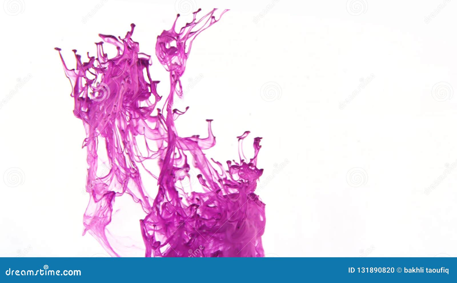 Purple Ink in Water Isolated on White Background. Stock Photo - Image ...