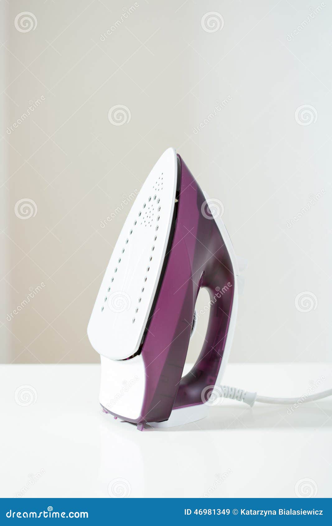 Purple Iron on White Ironing Board Stock Image - Image of housekeeper ...