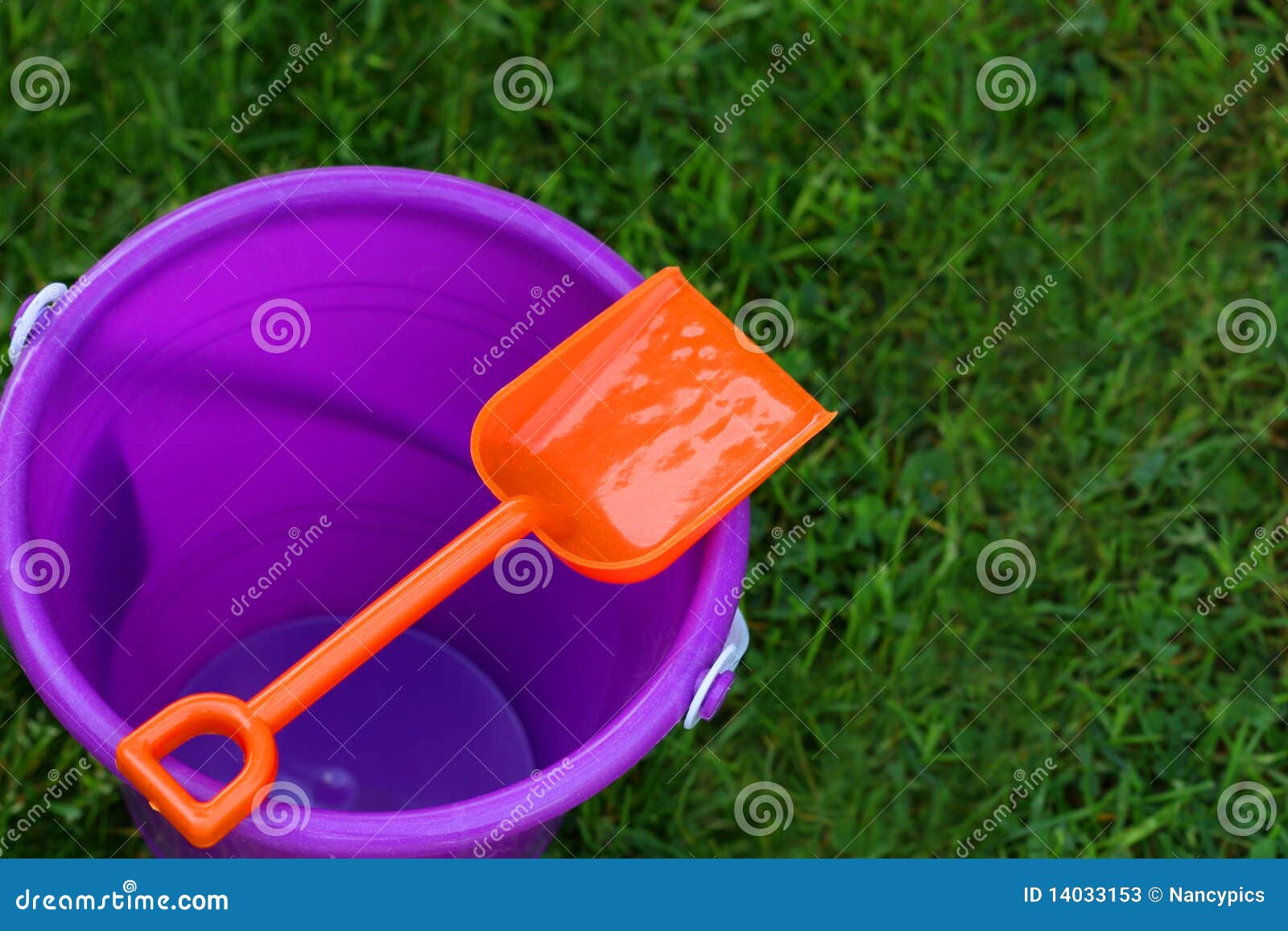 Purple Pail with Orange Shovel Stock Image - Image of backyard ...