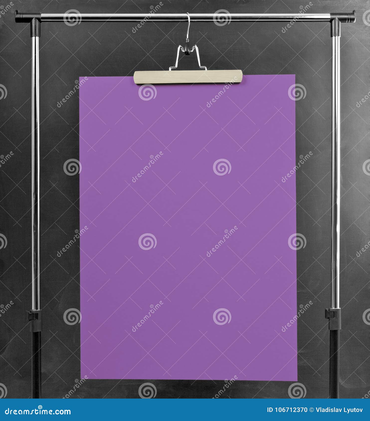 Purple Poster Hanging at a Clothes Rack. Stock Photo - Image of posters ...