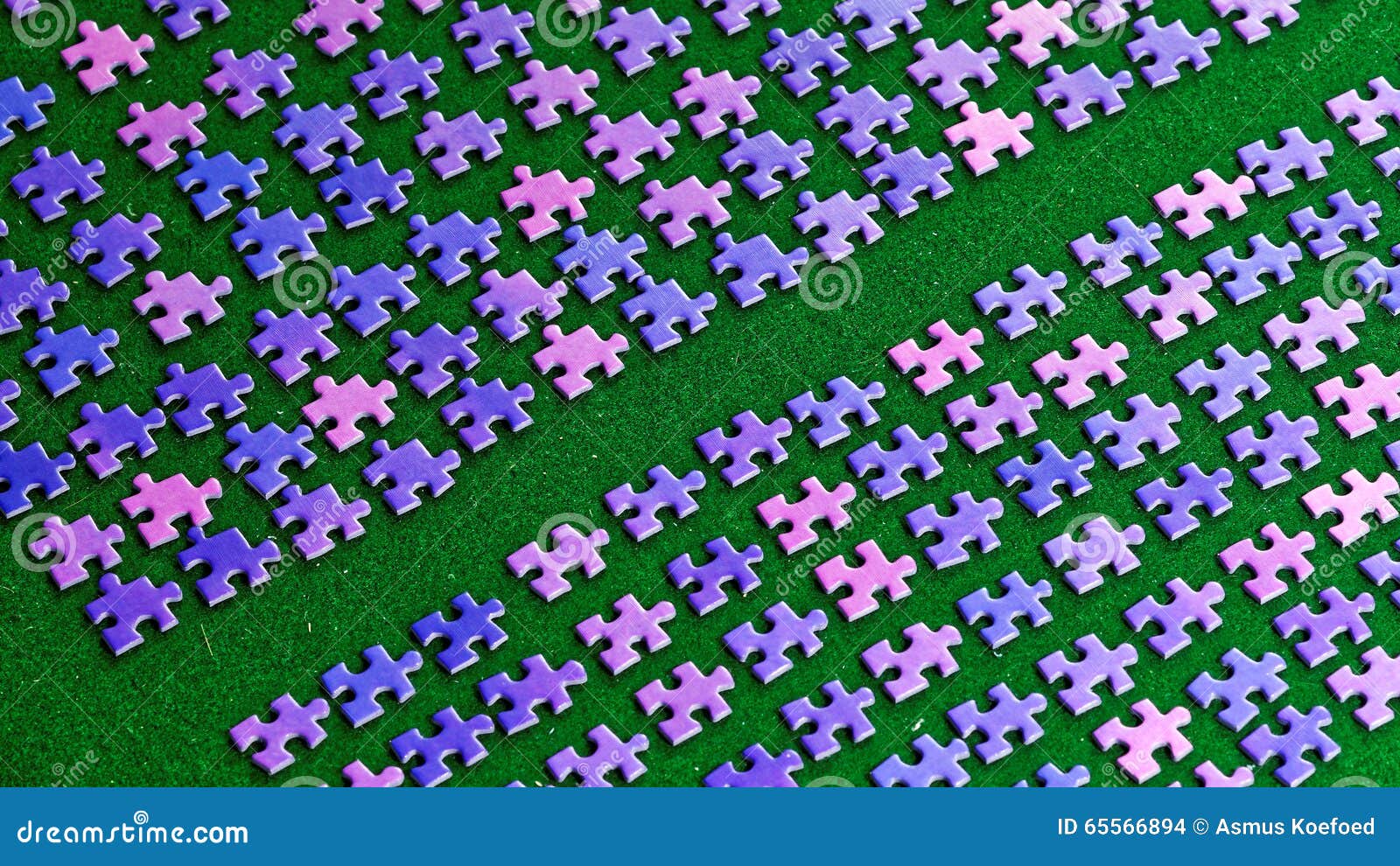 Purple Puzzle Pieces Sorted on a Green Table Cloth Stock Photo - Image ...