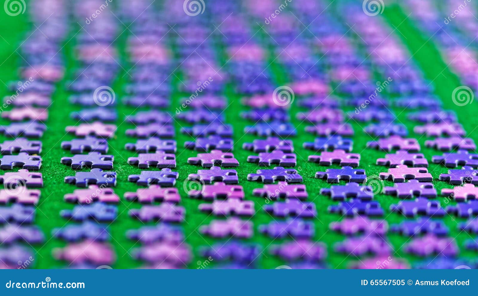 Purple Puzzle Pieces Sorted on a Green Table Cloth Stock Image - Image ...