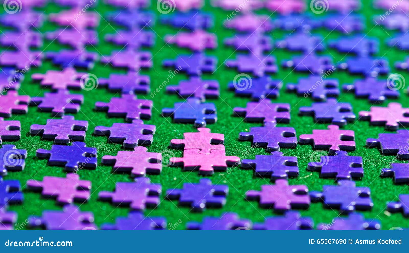 Purple Puzzle Pieces Sorted on a Green Table Cloth Stock Photo - Image ...