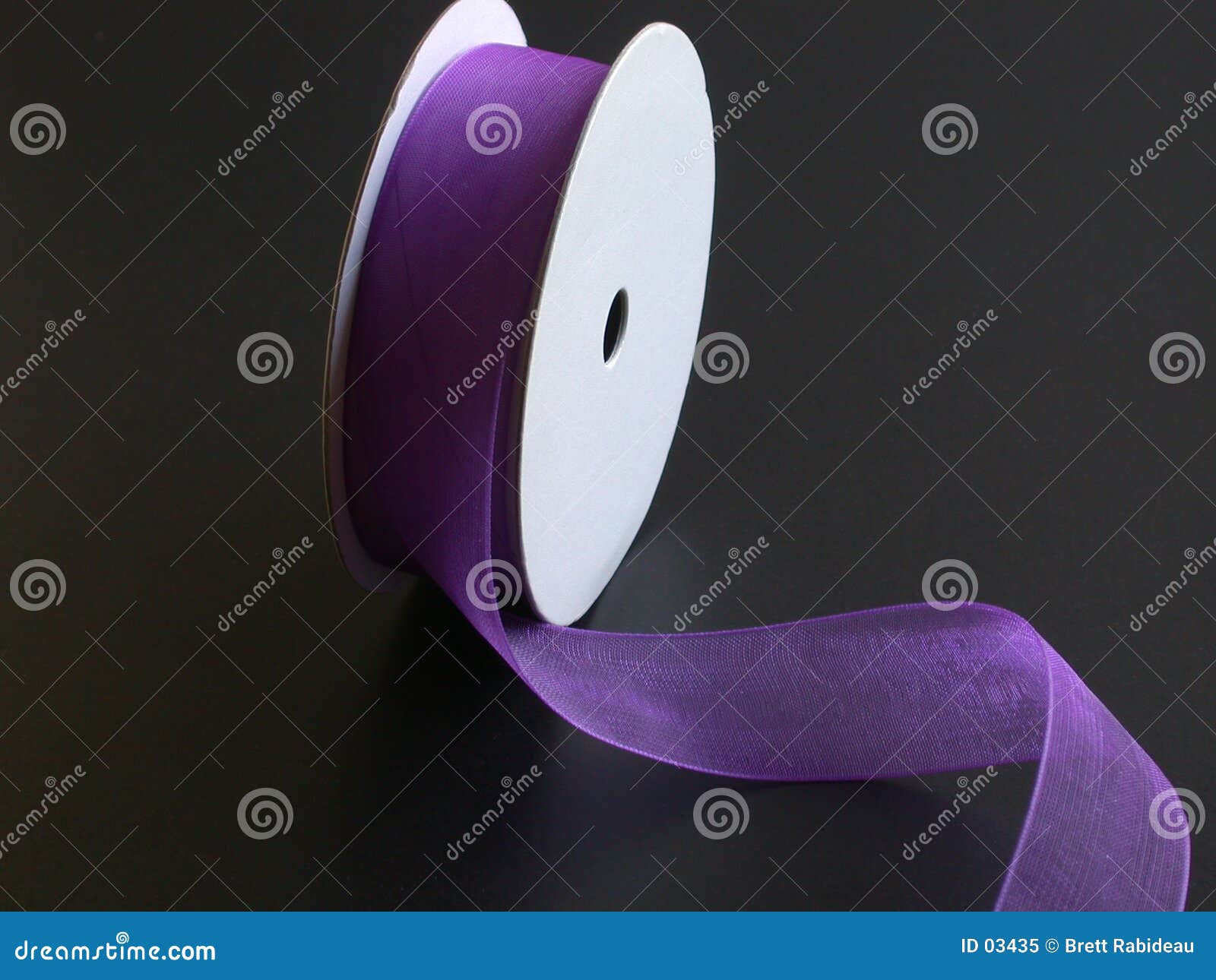 Purple Ribbon on a Black Background II Stock Image - Image of unravel ...