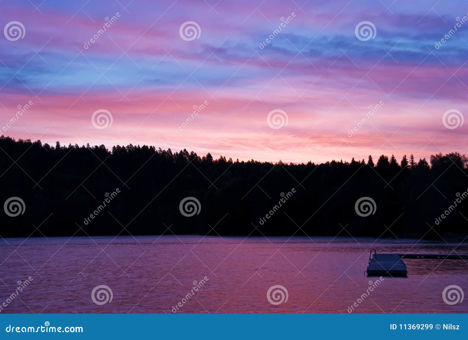 Purple Sky with Water Reflections and Swim Jetty Stock Image - Image of ...