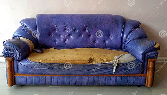 The Purple Sofa is Broken, the Sofa Cloth is Torn Stock Image - Image ...