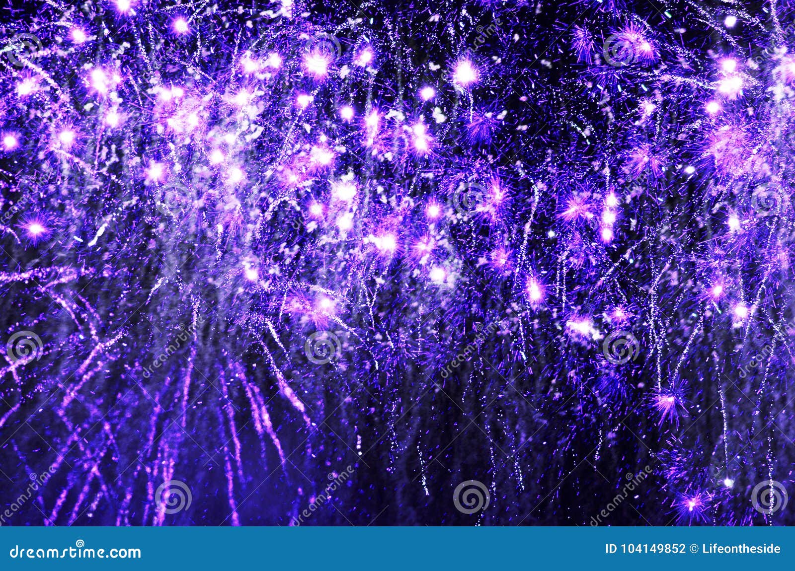 Purple Sparkling Fireworks Exploding in Black Night Sky Stock Photo ...