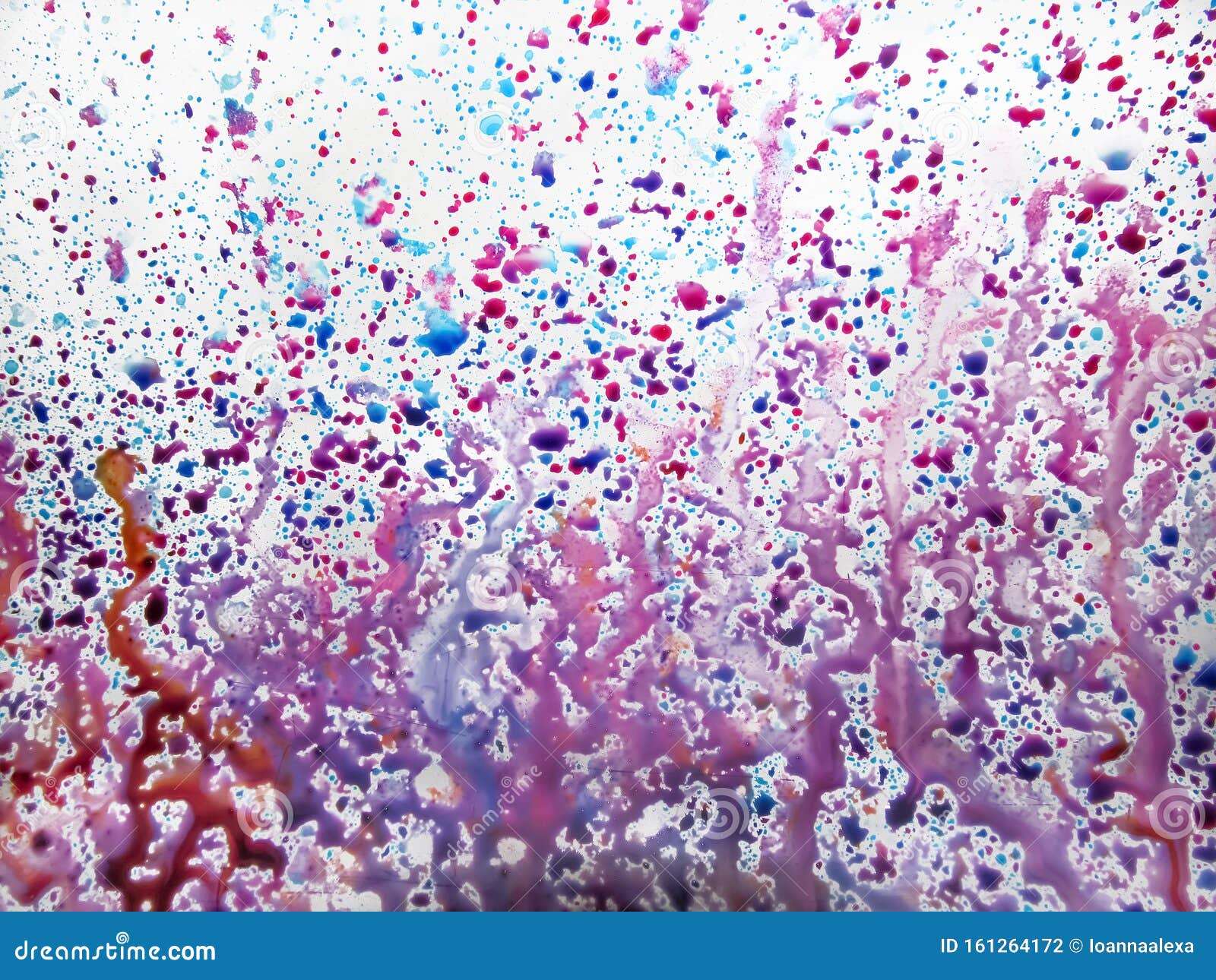 Purple Streams and Blue Splashes of Liquid Create an Abstract Pattern ...
