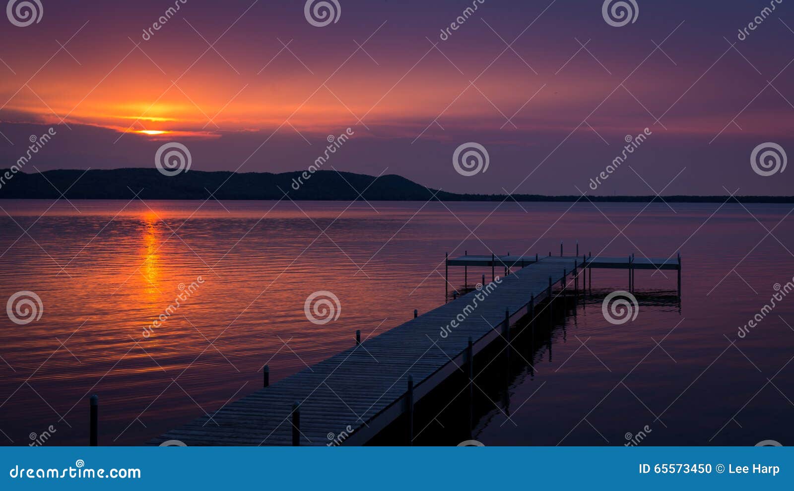 Purple Sunset Over the Dock Stock Photo - Image of michigan, mountains ...