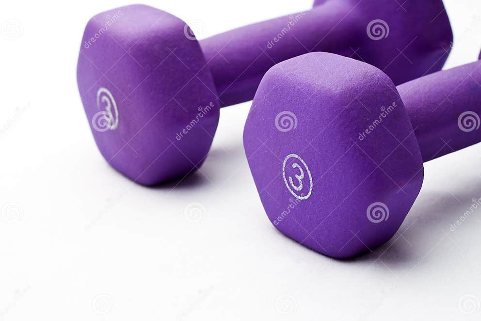 Purple Weights beside stock photo. Image of purple, exercise - 19643126