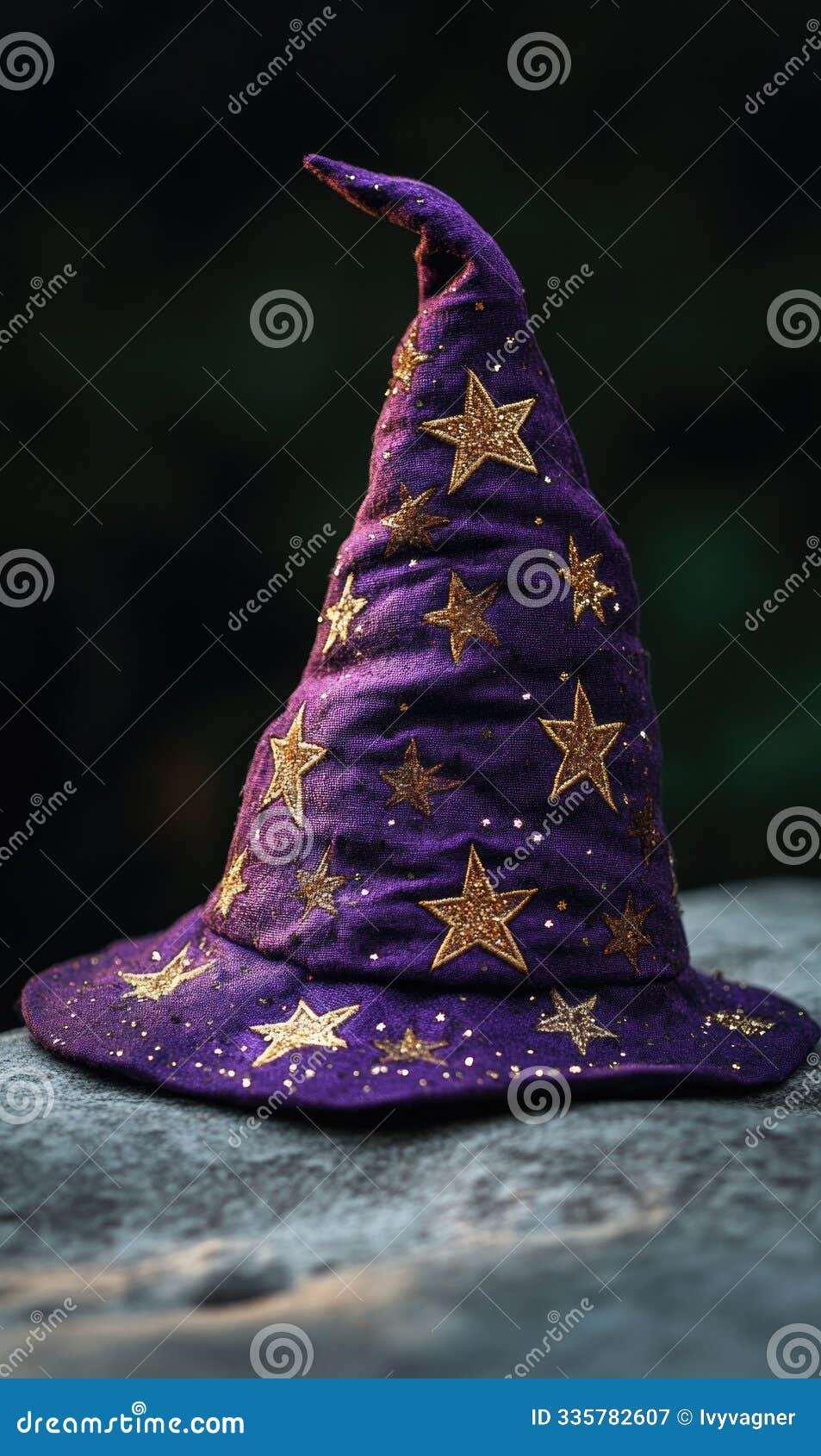 A Purple Wizard Hat, Gold Stars Embroidered on the Fabric Stock Image ...
