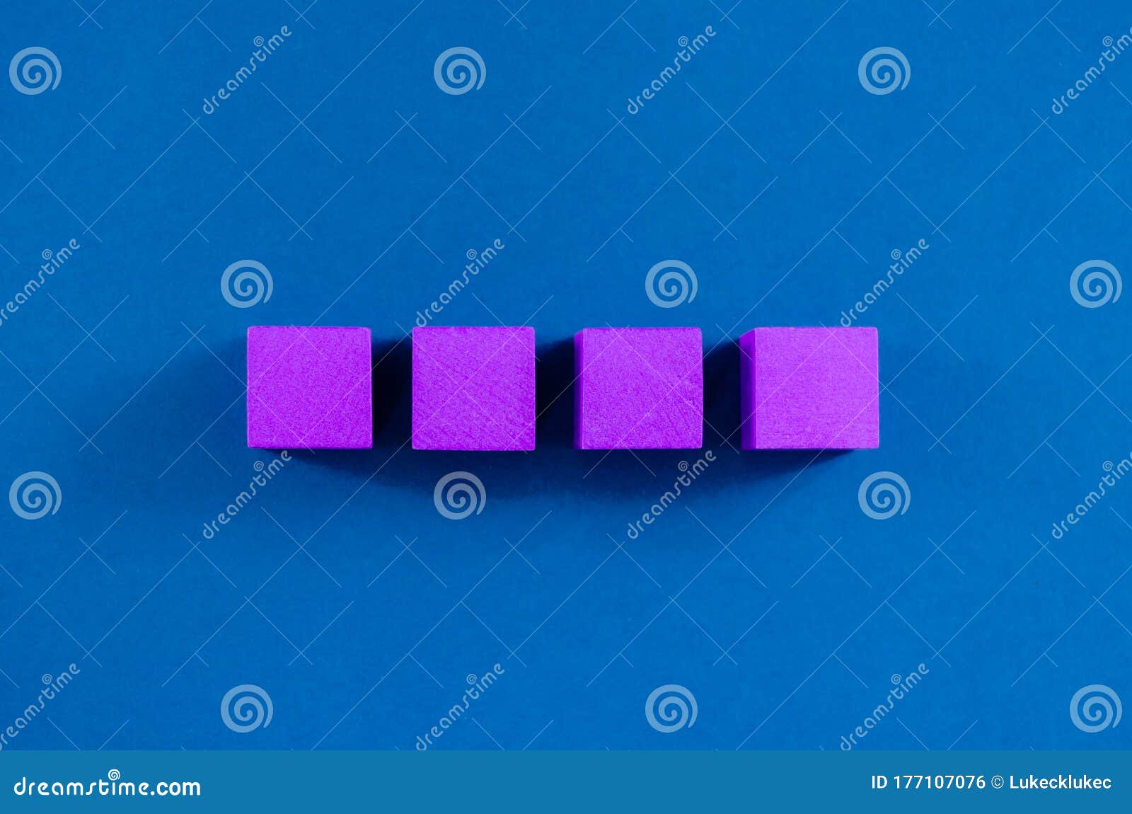 4 Purple Wooden Blocks Placed in a Row, with Copy Space Stock Photo ...