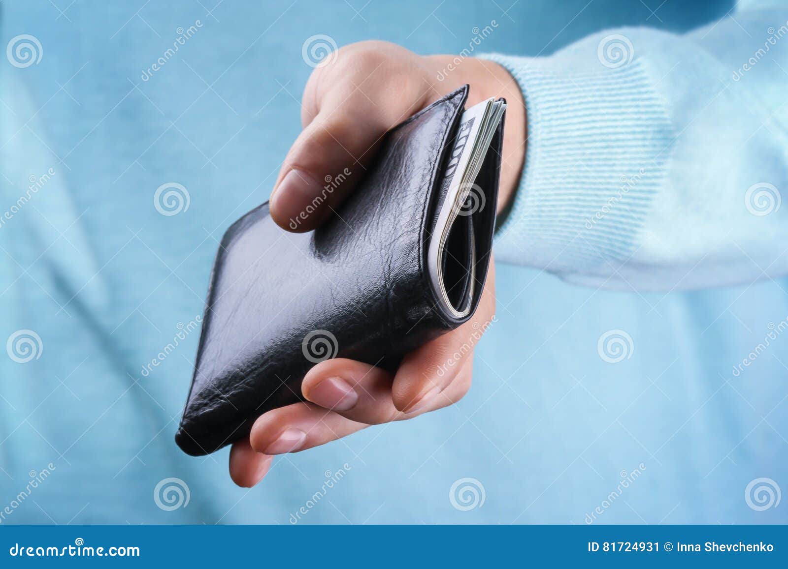 Purse with money in hand stock image. Image of holding - 81724931