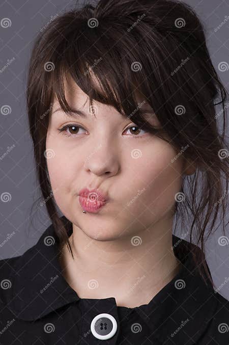 Purse one s lips stock photo. Image of cute, black, brown - 4937638